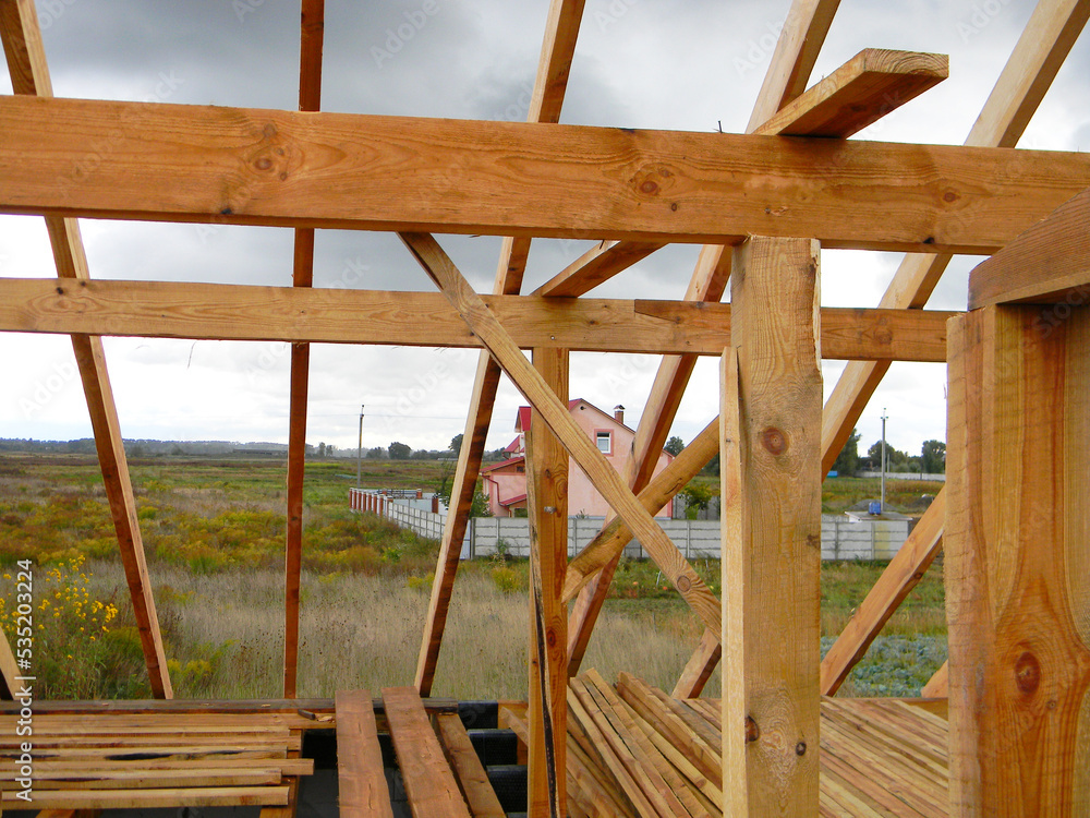 Wood framing during the roofing construction.Timber trusses, roof ...