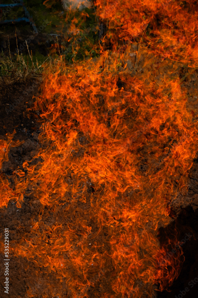 Foto de fire and water. gas that burns directly from the ground passing ...