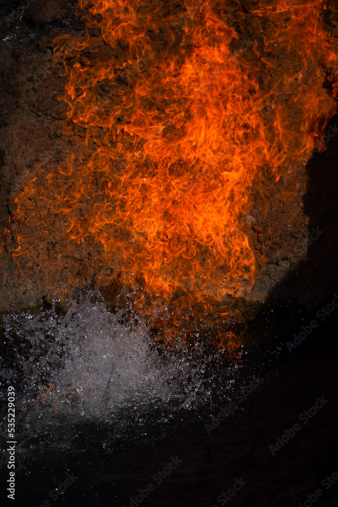 fire and water. gas that burns directly from the ground passing through ...