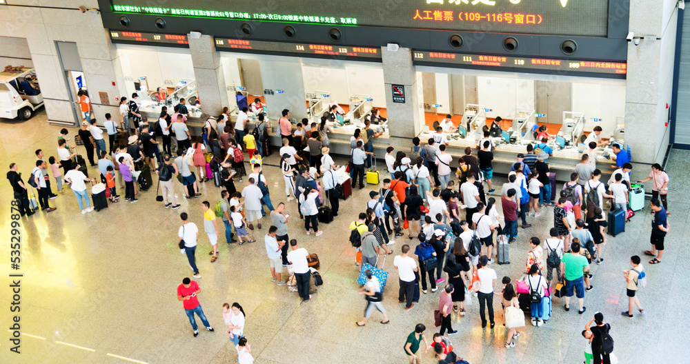 Large group of people waiting at train station hall Stock Photo | Adobe ...
