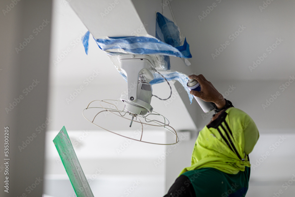 The old fan blade has been sprayed with new paint to make it look ...