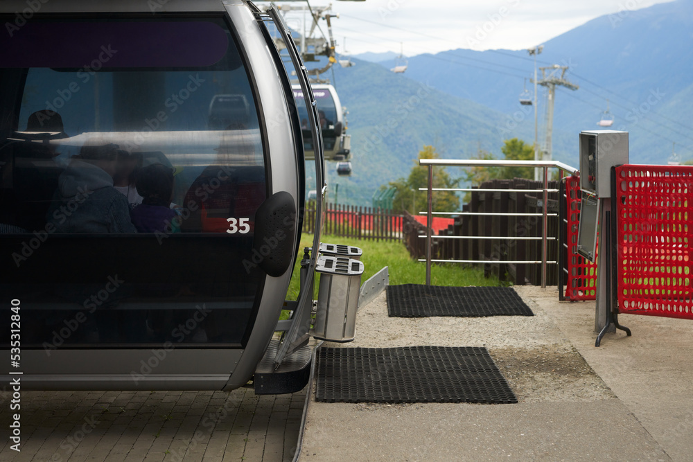 Suspended cable car of gondola type. A fragment of a cabin at the upper ...