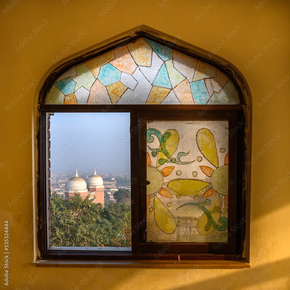 Veiw of Qasim Bagh gate through an ornate window in Multan, Pakistan ...