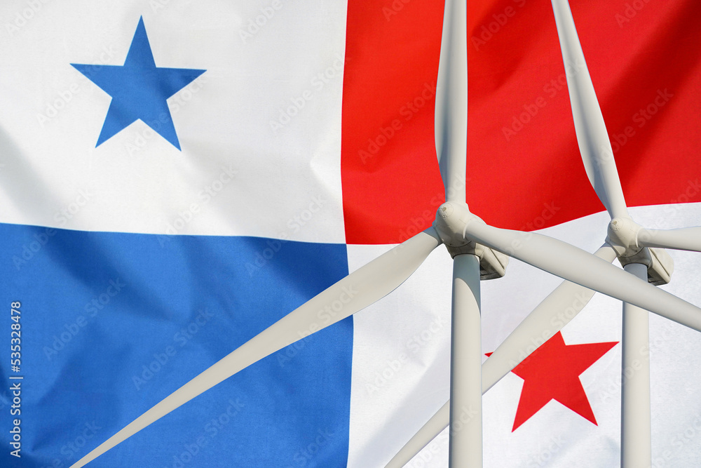 Two Wind Turbines for alternative energy on Panama flag background ...