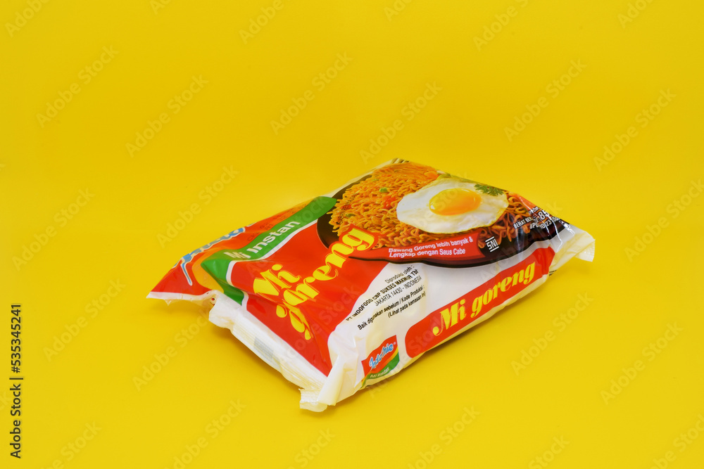 Indomie goreng instant noodles photo on a yellow background on October ...