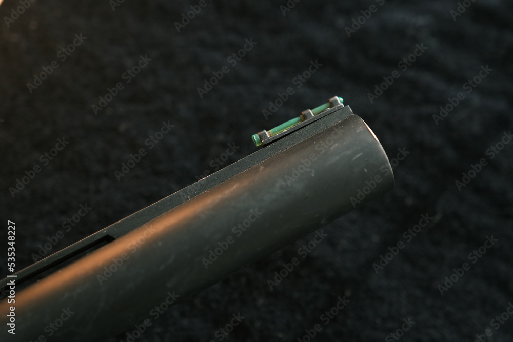 Muzzle of shotguns. Shotgun - macro shooting. Muzzle end of the barrel ...
