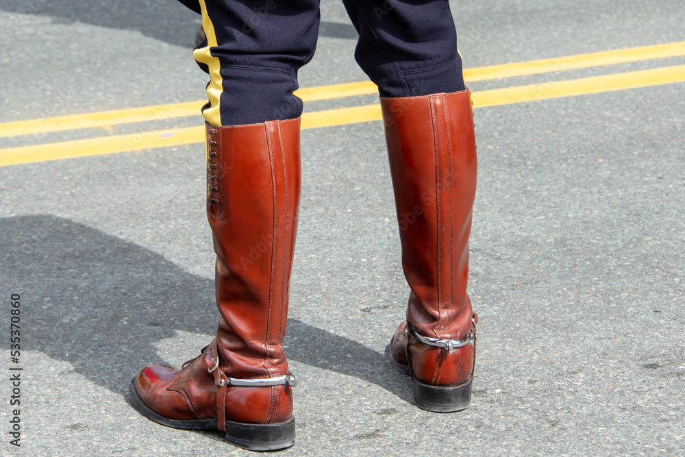 High brown leather boots were worn by a Royal Canadian Police, RCMP ...