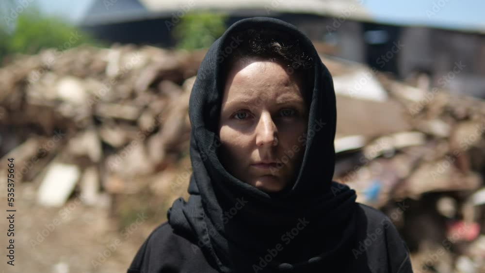 A close-up of the face of a widow in mourning heartbroken from the loss ...
