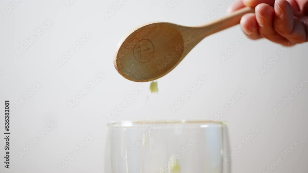 pouring milk powder into glass Stock Video | Adobe Stock