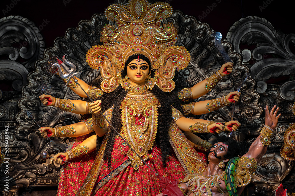 Idol of Goddess Devi Durga at a decorated puja pandal in Kolkata, West ...