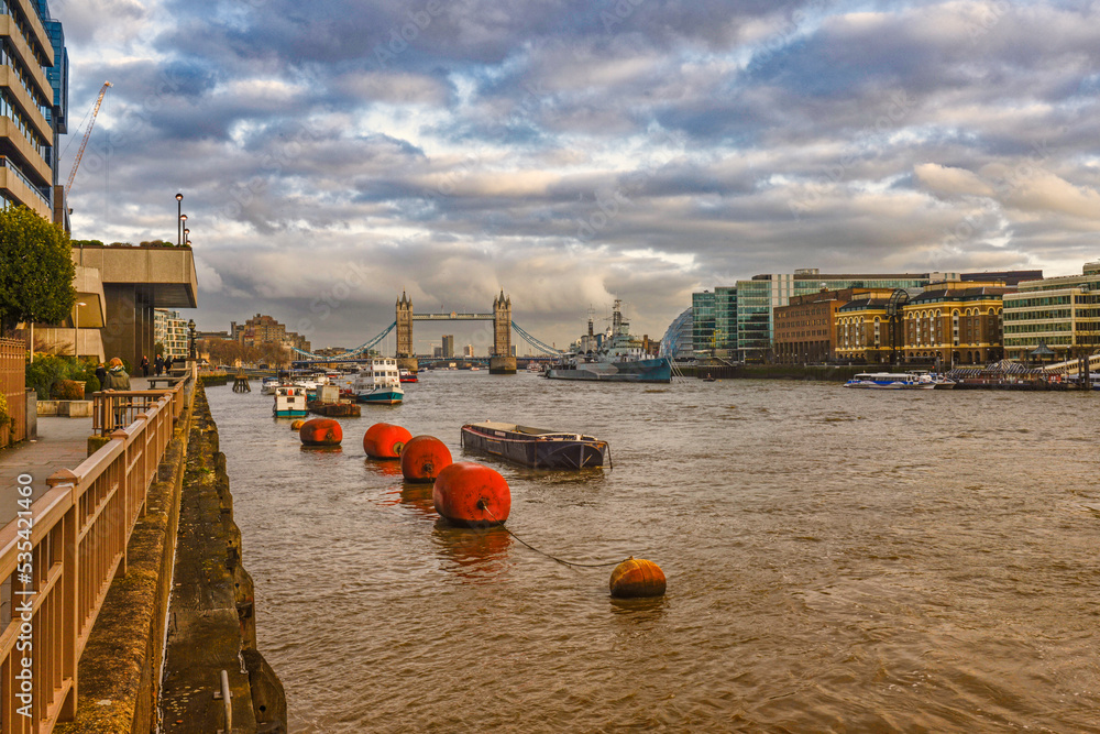Tower Bridge is a Grade I listed combined bascule and suspension bridge ...