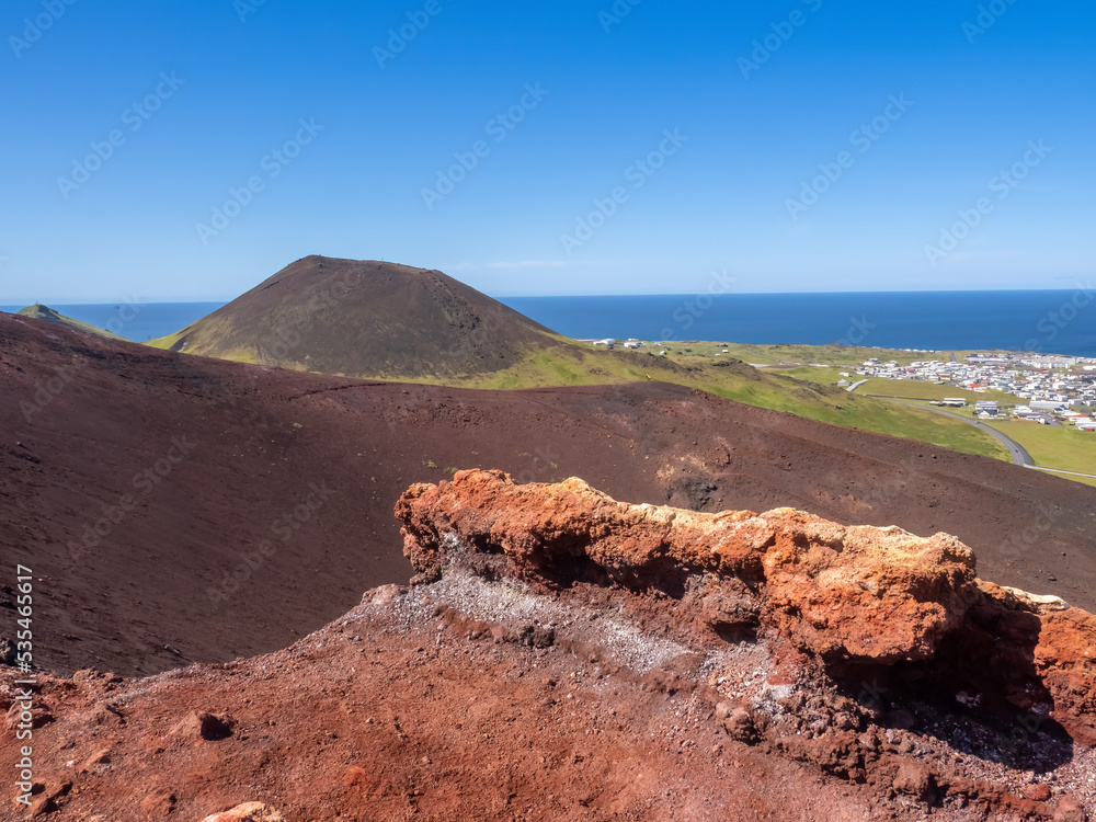 View of the Helgafell volcano from the top of the edge of the Eldfell ...
