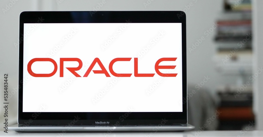 Logo of Oracle visible on a laptop screen traded computer software ...
