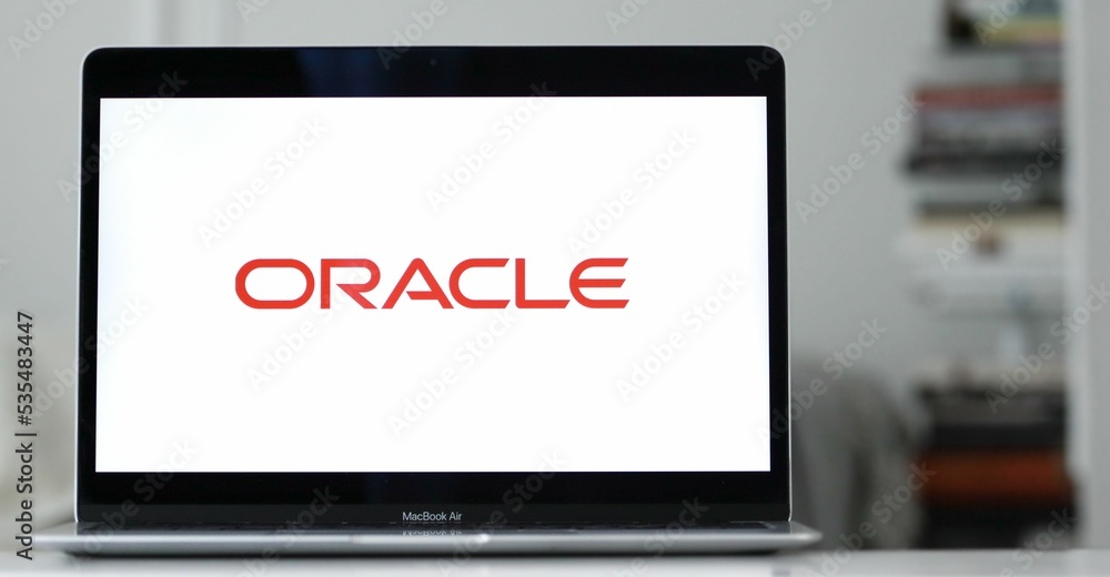 Logo of Oracle visible on a laptop screen traded computer software ...