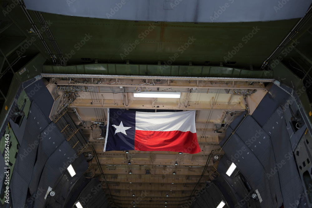 Foto de Texas flag in the military cargo airplane and aircraft. Wavy ...
