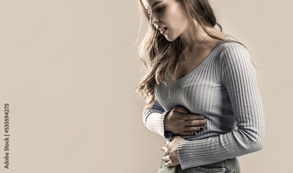 Foto Stock Girl Having A Stomachache Young Woman Suffering From foto-stock-girl-having-a-stomachache-young-woman-suffering-from