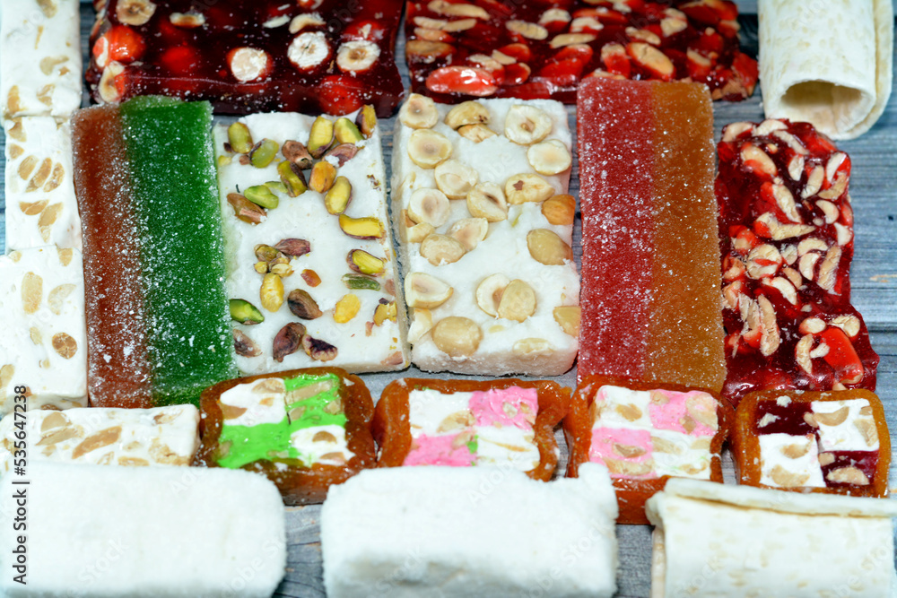 Collection of Arabian sweet candies with nuts, peanuts, hazelnuts and ...