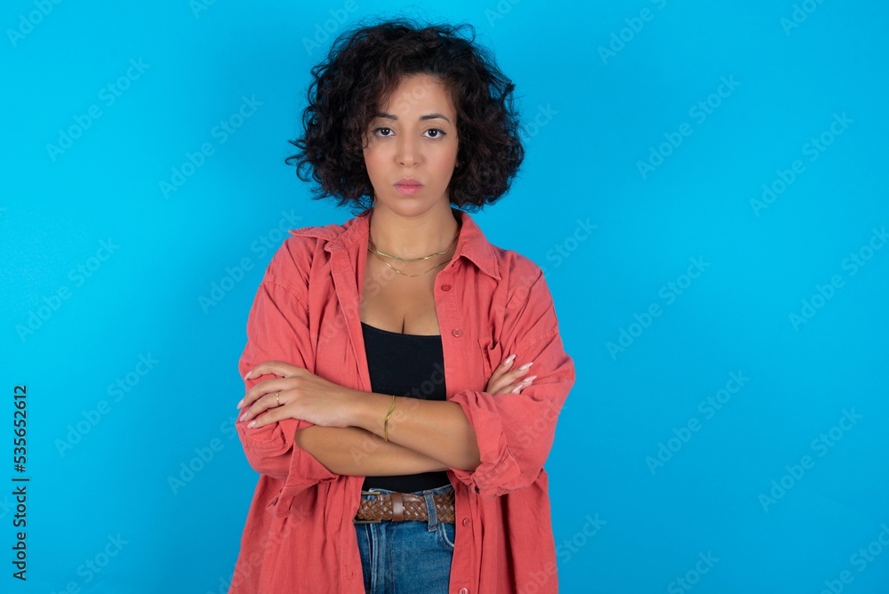 Picture of angry young beautiful woman with curly short hair wearing ...