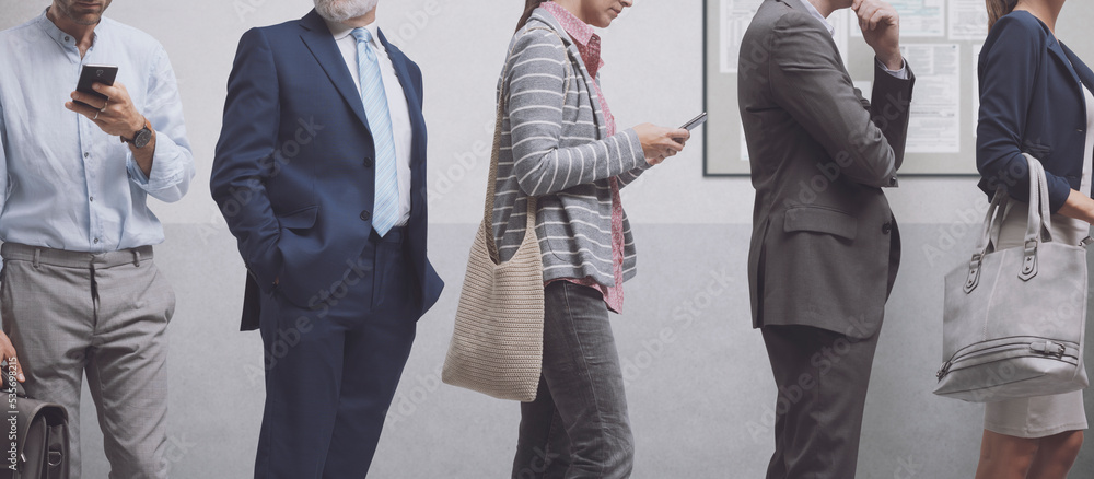 Diverse people waiting in line Stock Photo | Adobe Stock