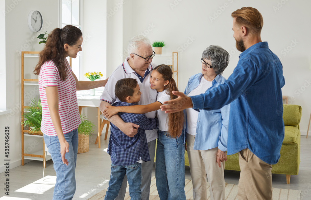 Multigenerational family meet together. Large friendly family meets ...