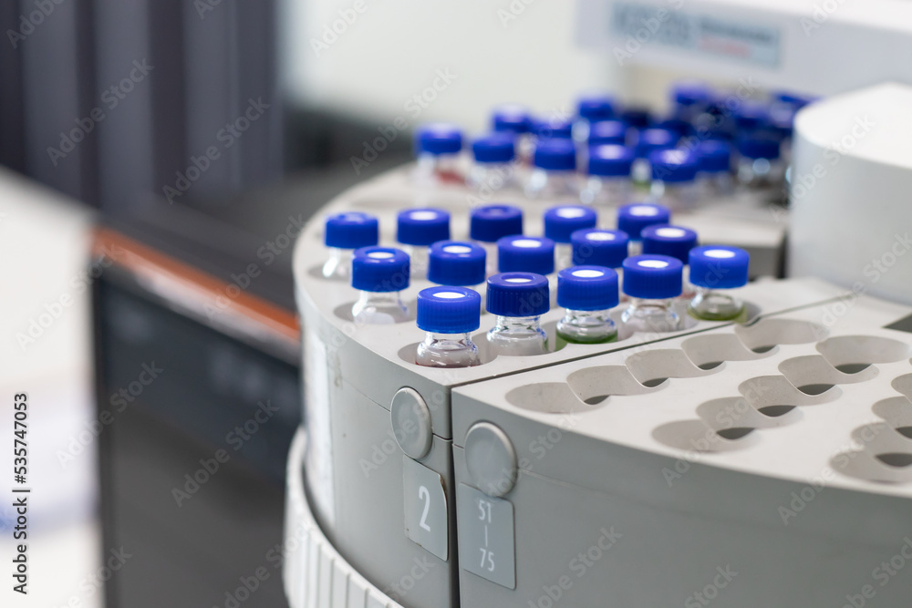 vial on autosampler of gas chromatography instrument in chemistry, gc ...