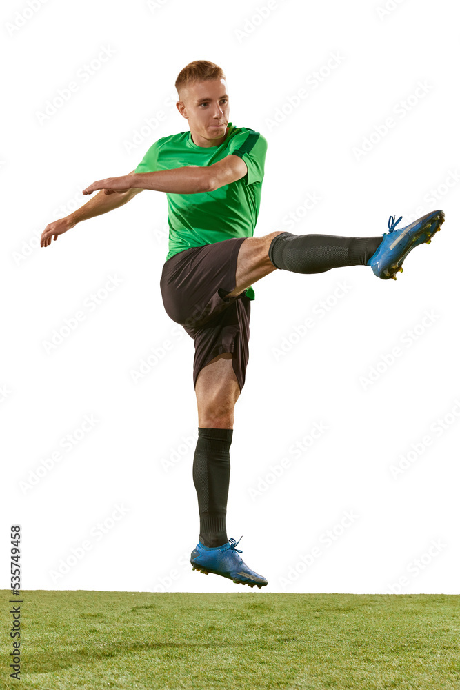 Leg kick. One young man, professional soccer football player training ...