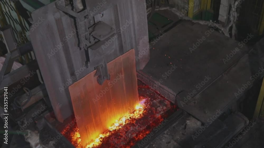 The furnace with molten metal, the melting of copper in the furnace ...