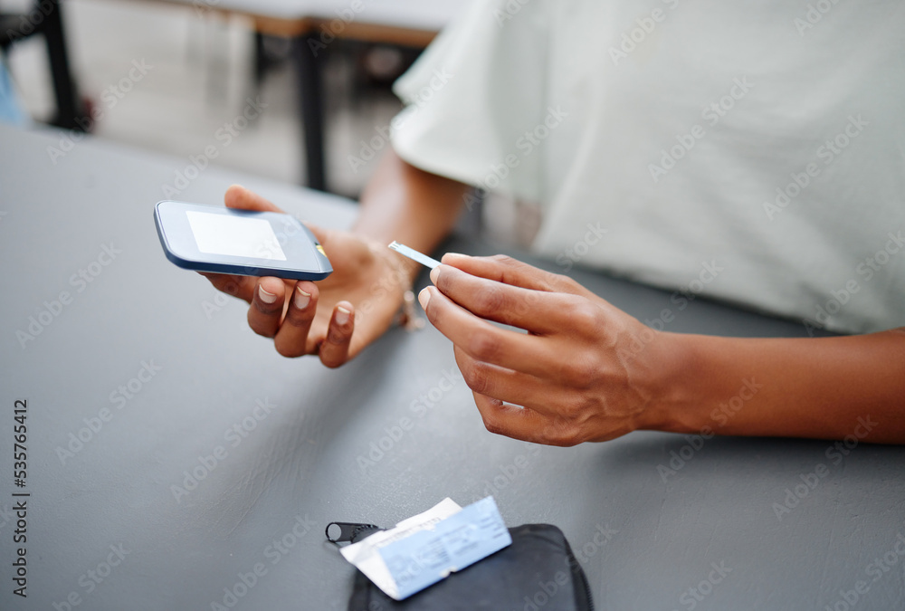 Diabetes, hands and black woman with glucometer on desk checking blood ...