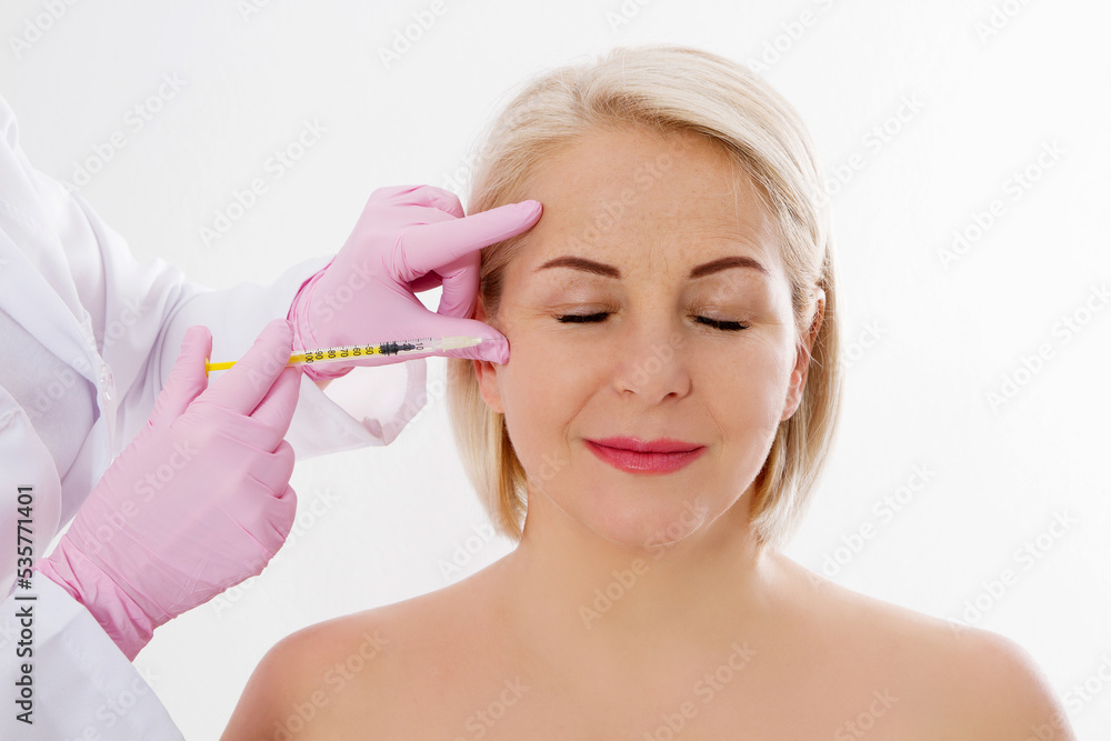 Foto de Plastic Surgery Concept. Doctor Hands Making Anti Aging Face ...