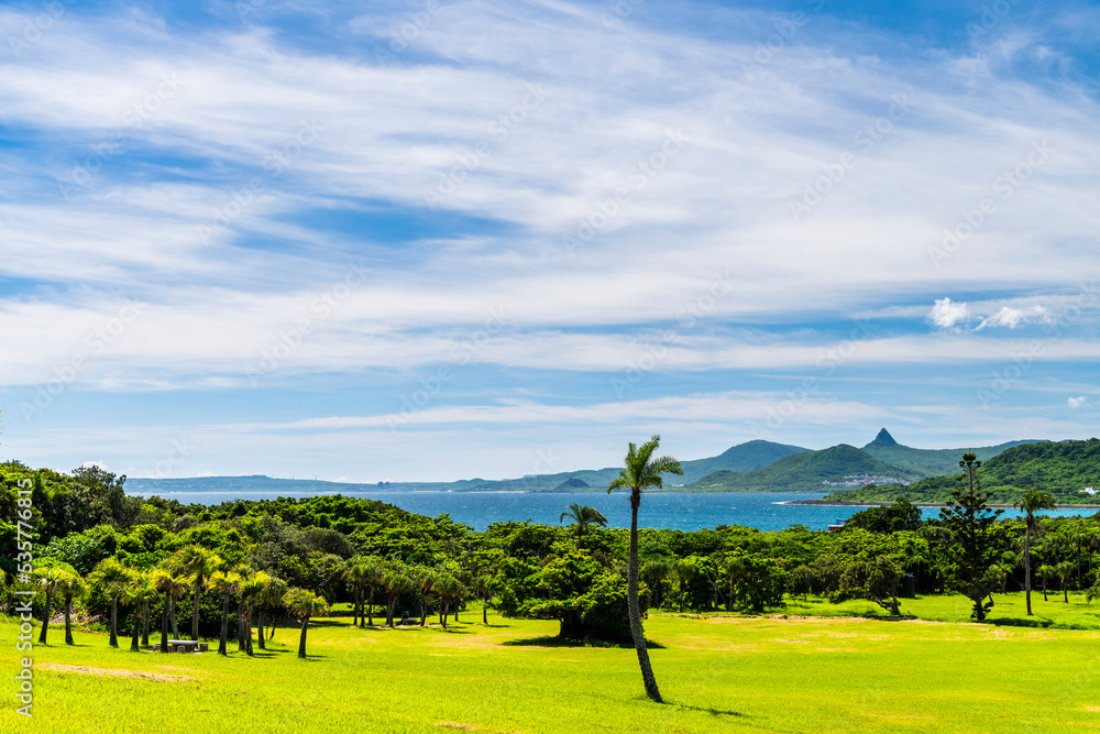 The beautiful grasslands, woods, and blue sky background in Eluanbi ...