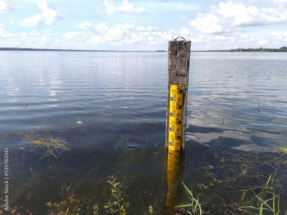 Scale measures the water level in the dam. Stock Photo | Adobe Stock
