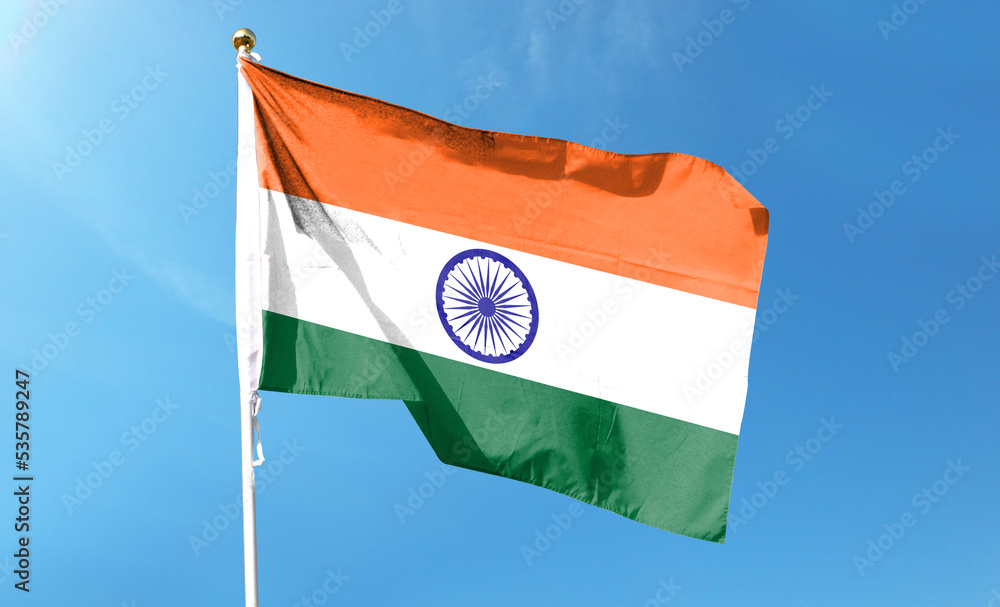 India flag isolated on the blue sky with clipping path. close up waving ...
