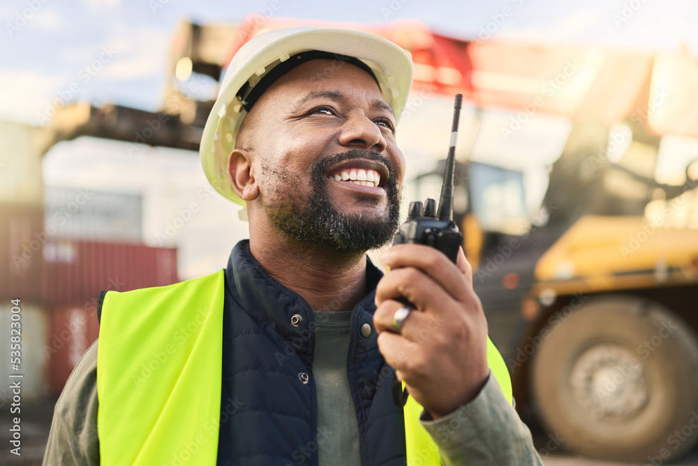 Man using radio communication, shipping logistics and supply chain ...