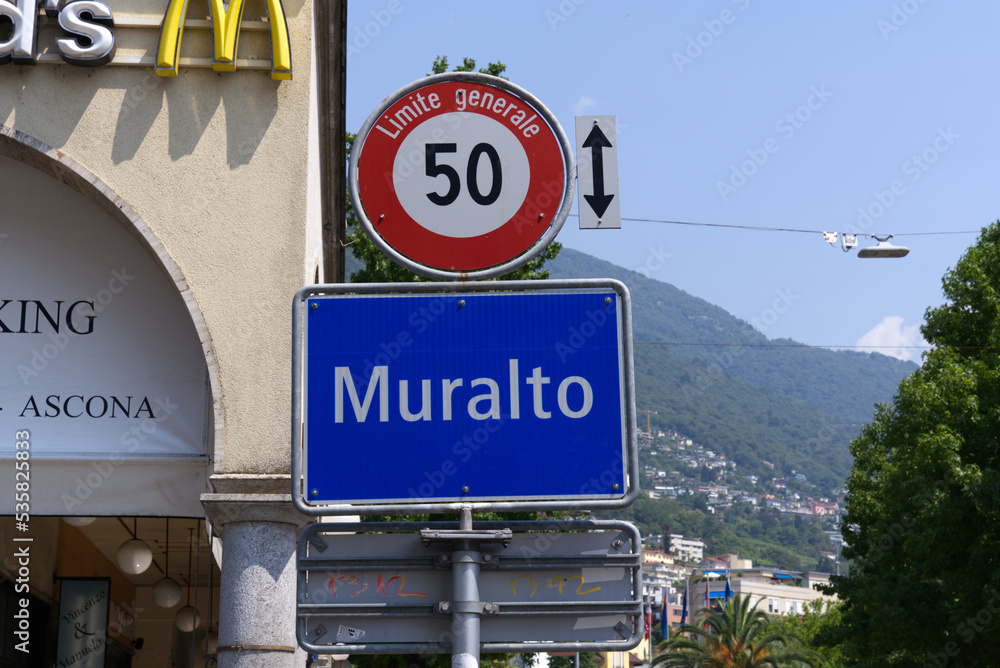 City of Locarno, Canton Ticino, with road sign of Muralto and speed ...