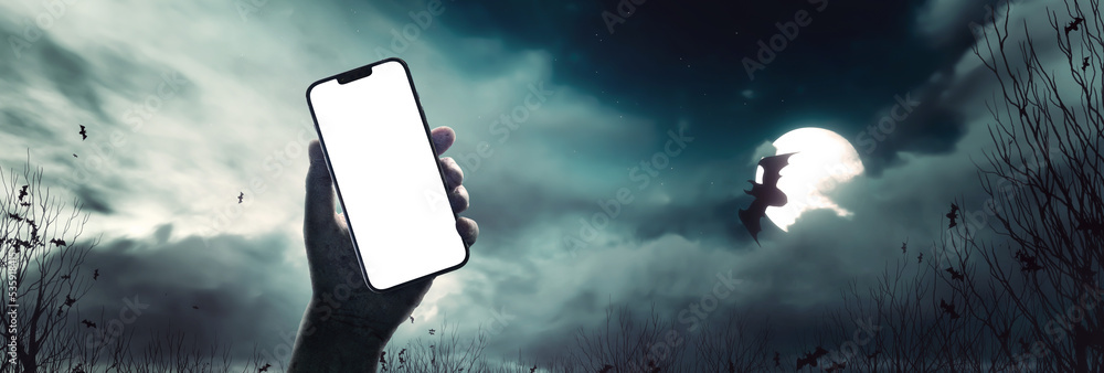 zombie hand holding a mobile phone on Halloween night - transparent PNG ...
