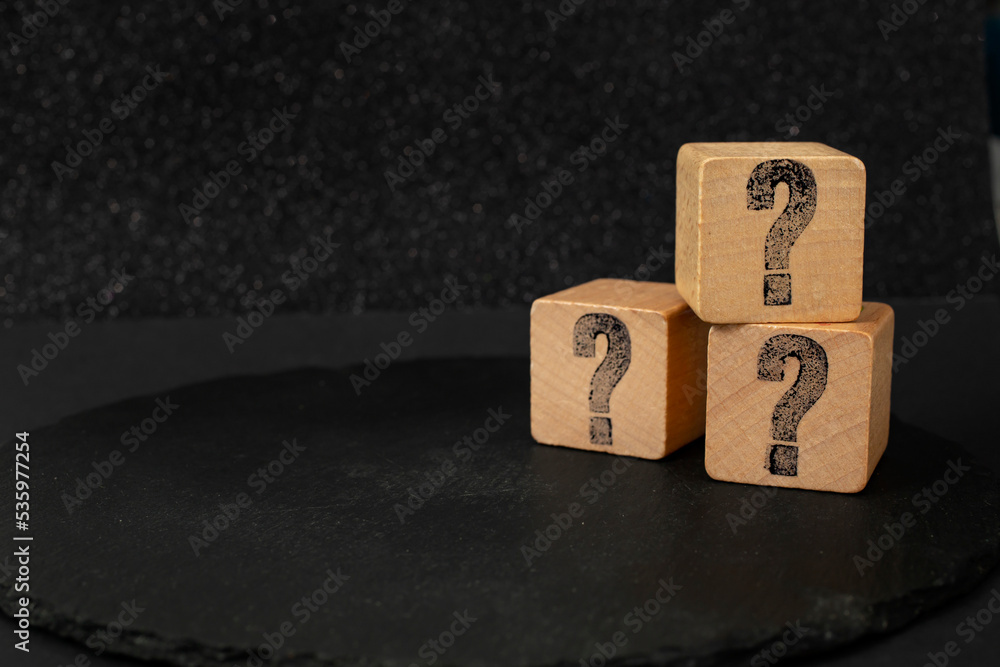 question mark on 3 wood blocks, isolated Stock Photo | Adobe Stock