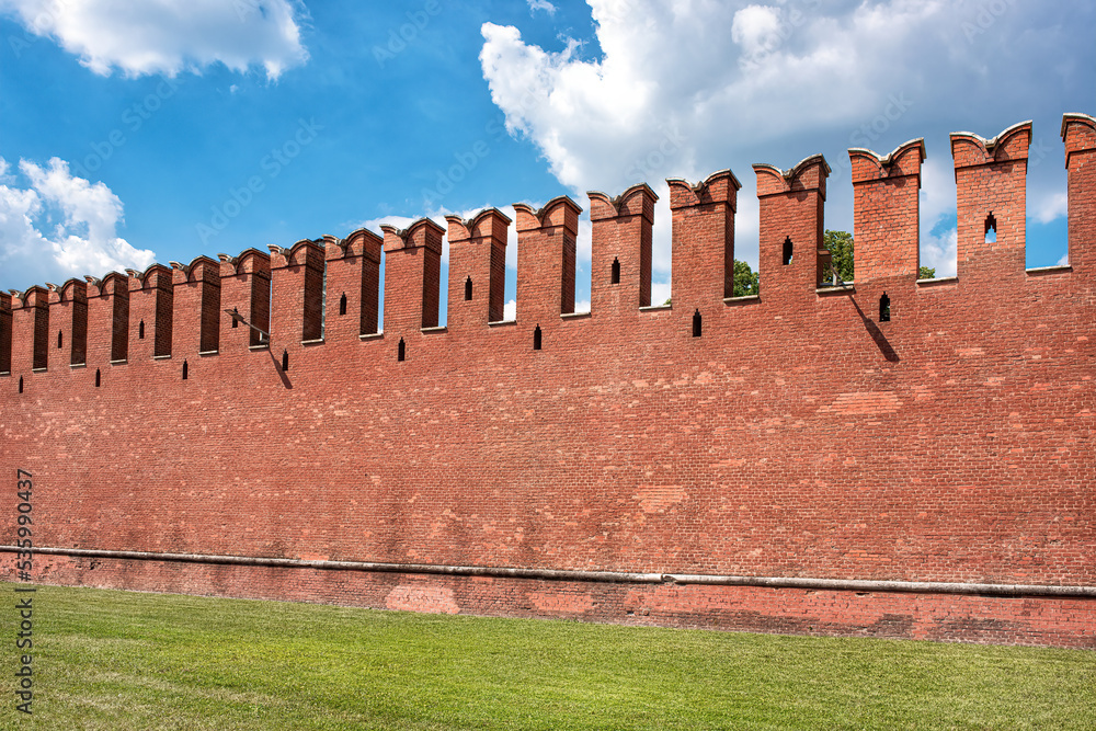 The famous Kremlin wall with dovetail crenellations. The texture of the ...