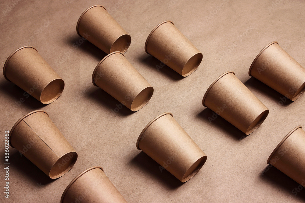 Disposable empty paper coffee cups. Recycling, eco-friendly tableware ...