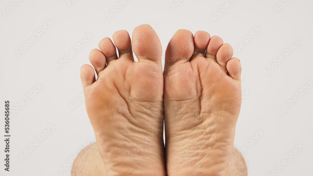 Asian Male soles barefoot are isolated on white background. Stock Photo ...