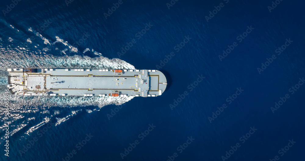 Aerial top down view of a big car carrier ship RO-RO (Roll on Roll off ...
