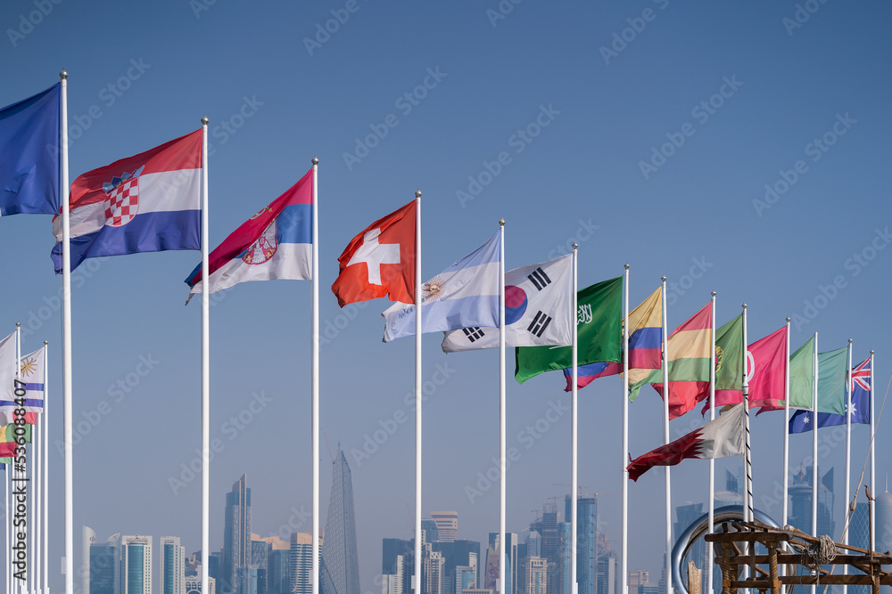 Flags of nations qualified for World Cup 2022 Qatar at Doha Corniche ...
