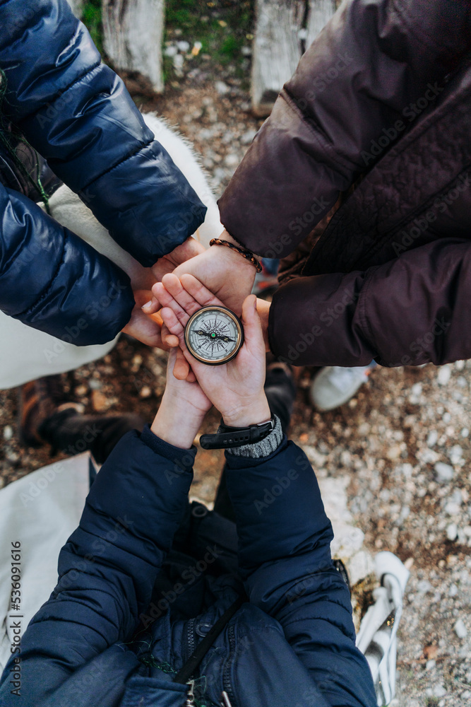 group of children holding a compass Stock Photo | Adobe Stock
