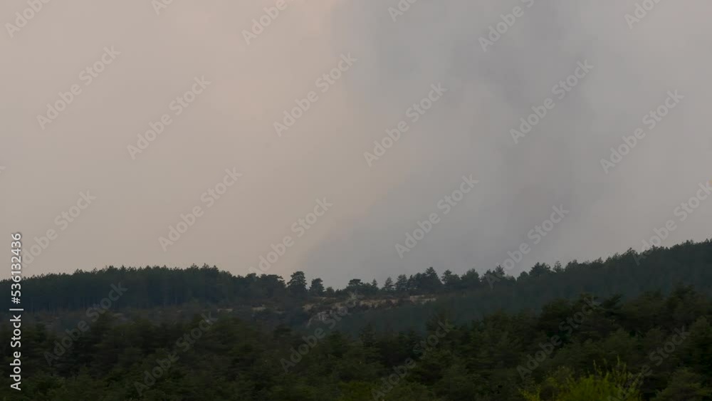 Three Canadair aircraft from the civil security fleet approach a large ...
