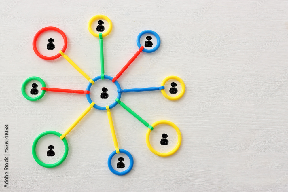 Concept image of unity and teamwork. People icons tied together as a ...