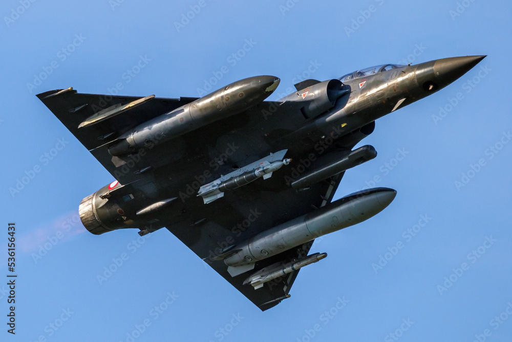 Armed delta wing fighter jet aircraft Stock Photo | Adobe Stock