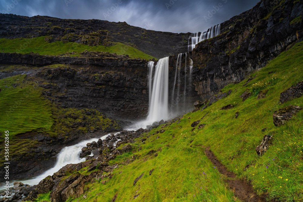 Fossá waterfall is the tallest waterfall in the Faroe Islands. Stock ...