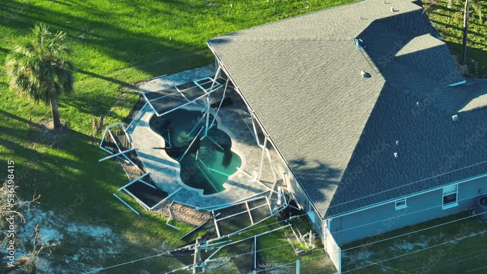 Hurricane Ian destroyed swimming pool lanai enclosure on house yard in ...