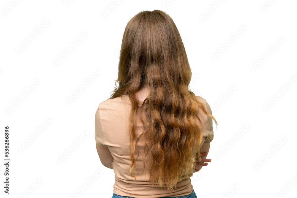 Young pretty woman over isolated background in back position Stock ...