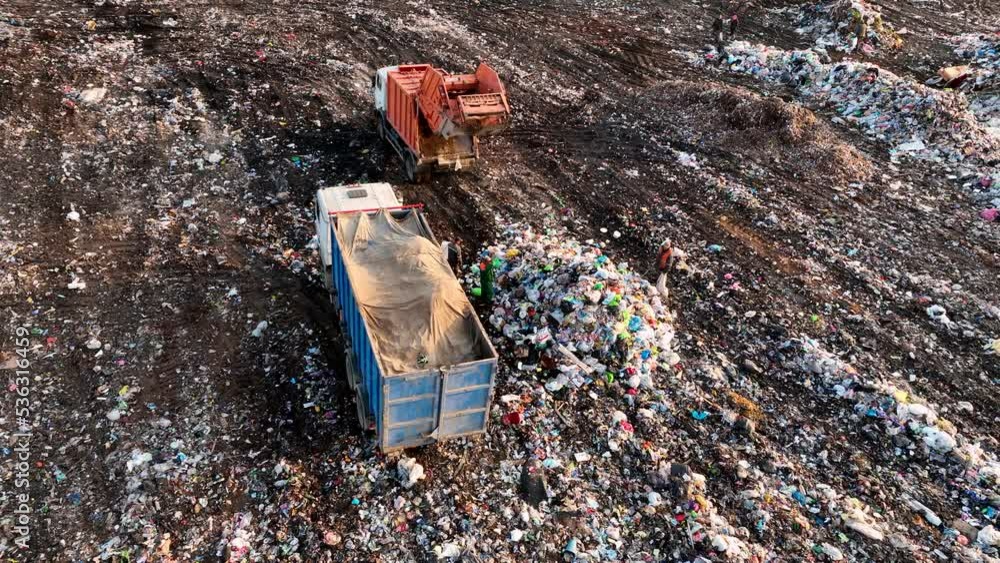 Video Stock Garbage truck unloads rubbish. Landfill with solid ...
