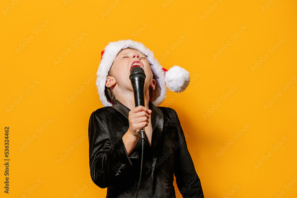 Boy singing loud Christmas song Stock Photo | Adobe Stock
